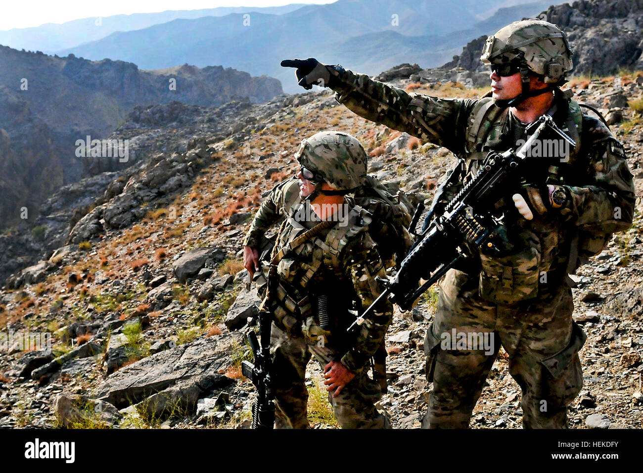 U.S. Army Spc. Ryan Roach ,(left) of Tulsa Okla, a grenadier with Bravo ...