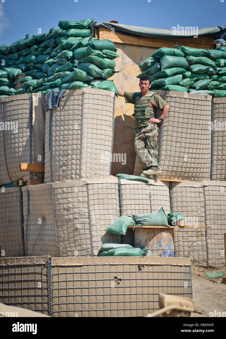 An Afghan National Army soldier watches as a joint patrol with ANA ...