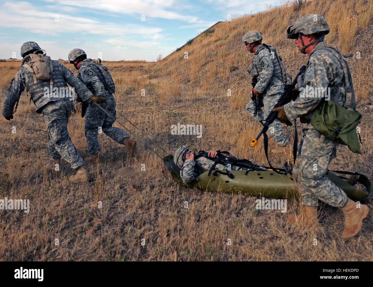 Soldiers from the 1186th Military Police Company, Oregon Army National Guard, transport a ...