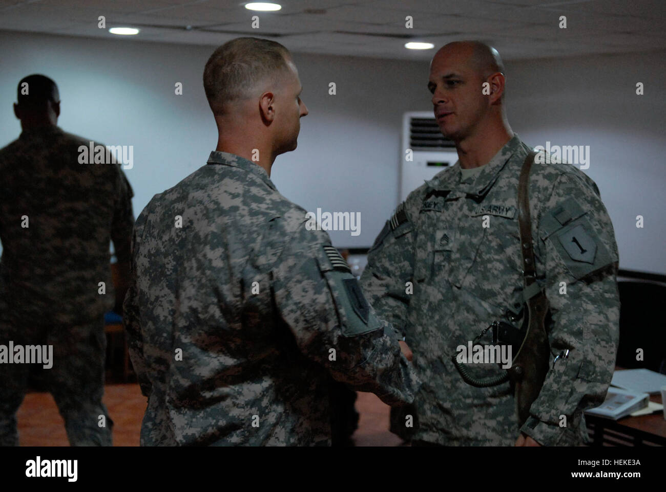 Sgt. 1st Class William Mackey, right, a platoon sergeant with 1st ...