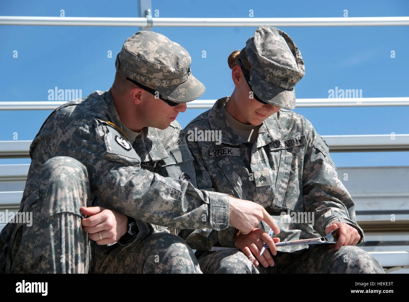 Staff Sgt. Joshua Feltman assists Sgt. Lynn Lyrek, both from 193rd ...