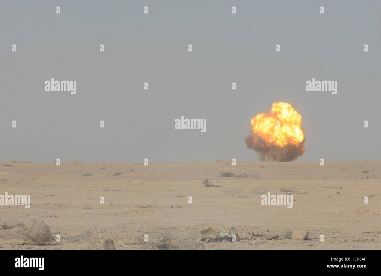 A mushroom cloud forms in the distance after the 722nd Explosive ...