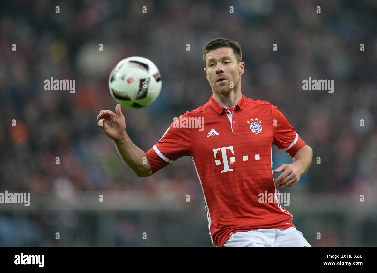 Munich, Germany. 21st Dec, 2016. Munich's Xabi Alonso on the ball in ...