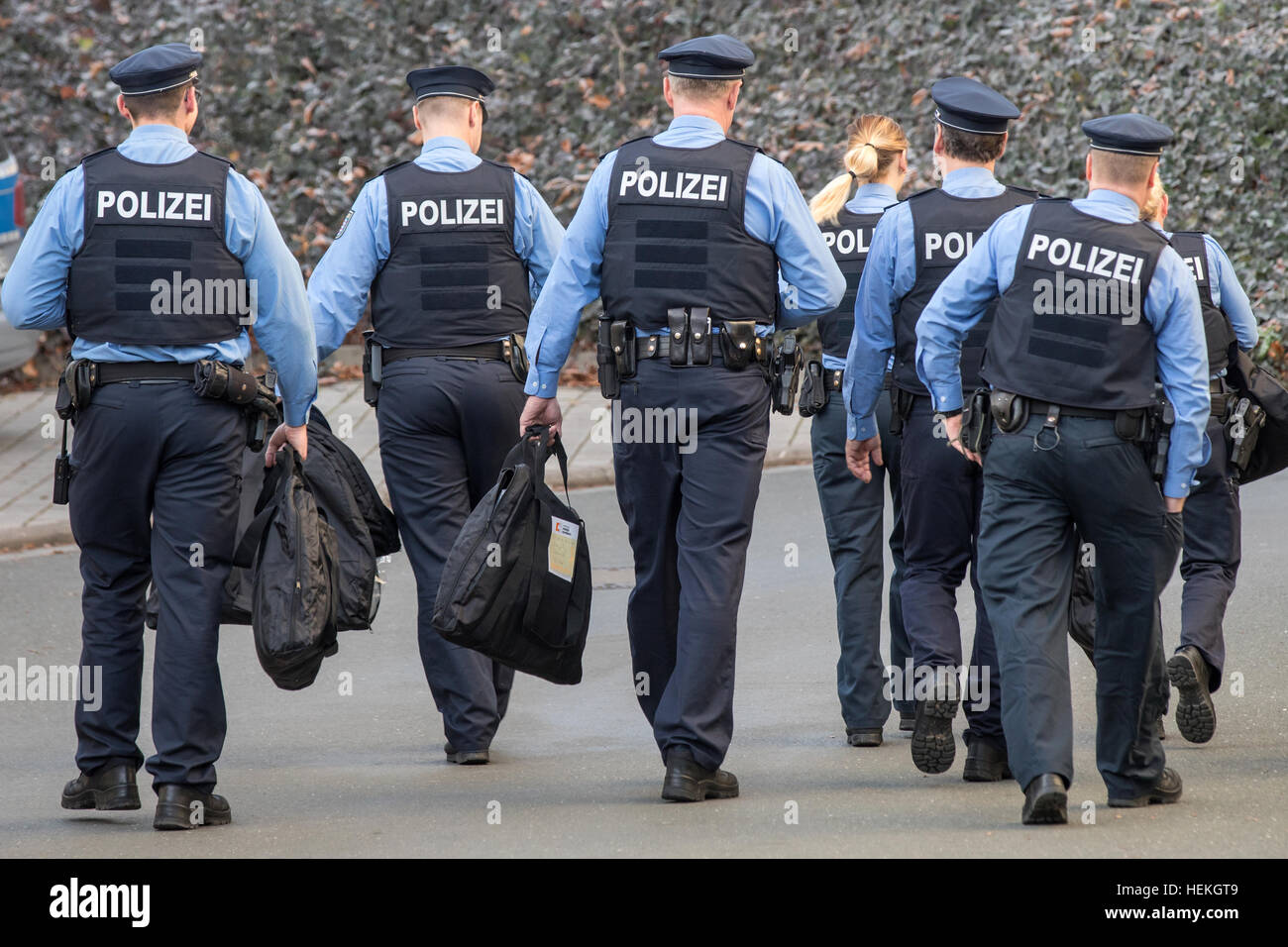 Erfurt, Germany. 22nd Dec, 2016. Police officers wearing newly issued ...