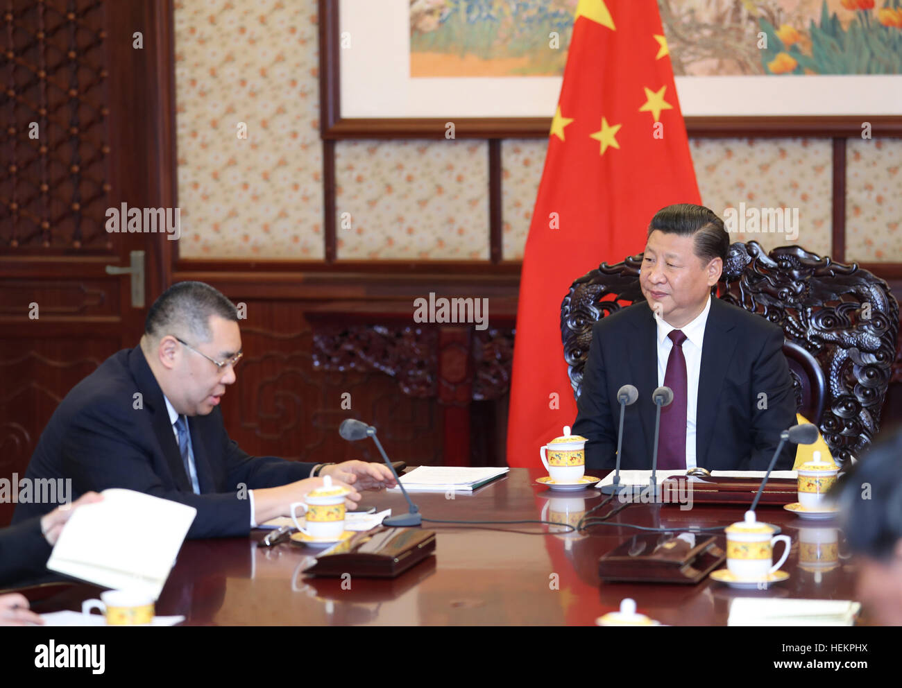 Beijing, China. 23rd Dec, 2016. Chinese President Xi Jinping (R) meets ...