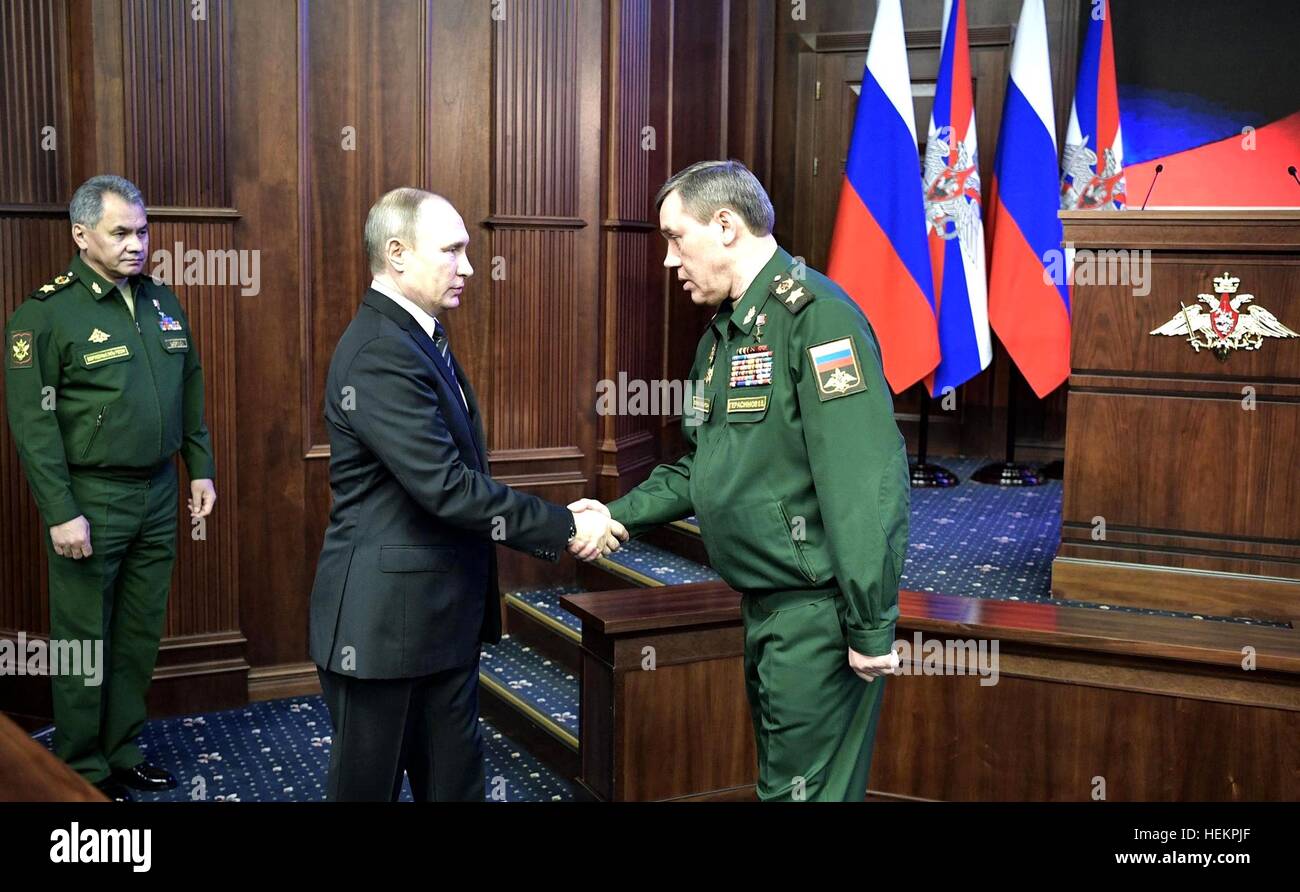 Moscow, Russia. 22nd Dec, 2016. Russian President Vladimir Putin greets ...