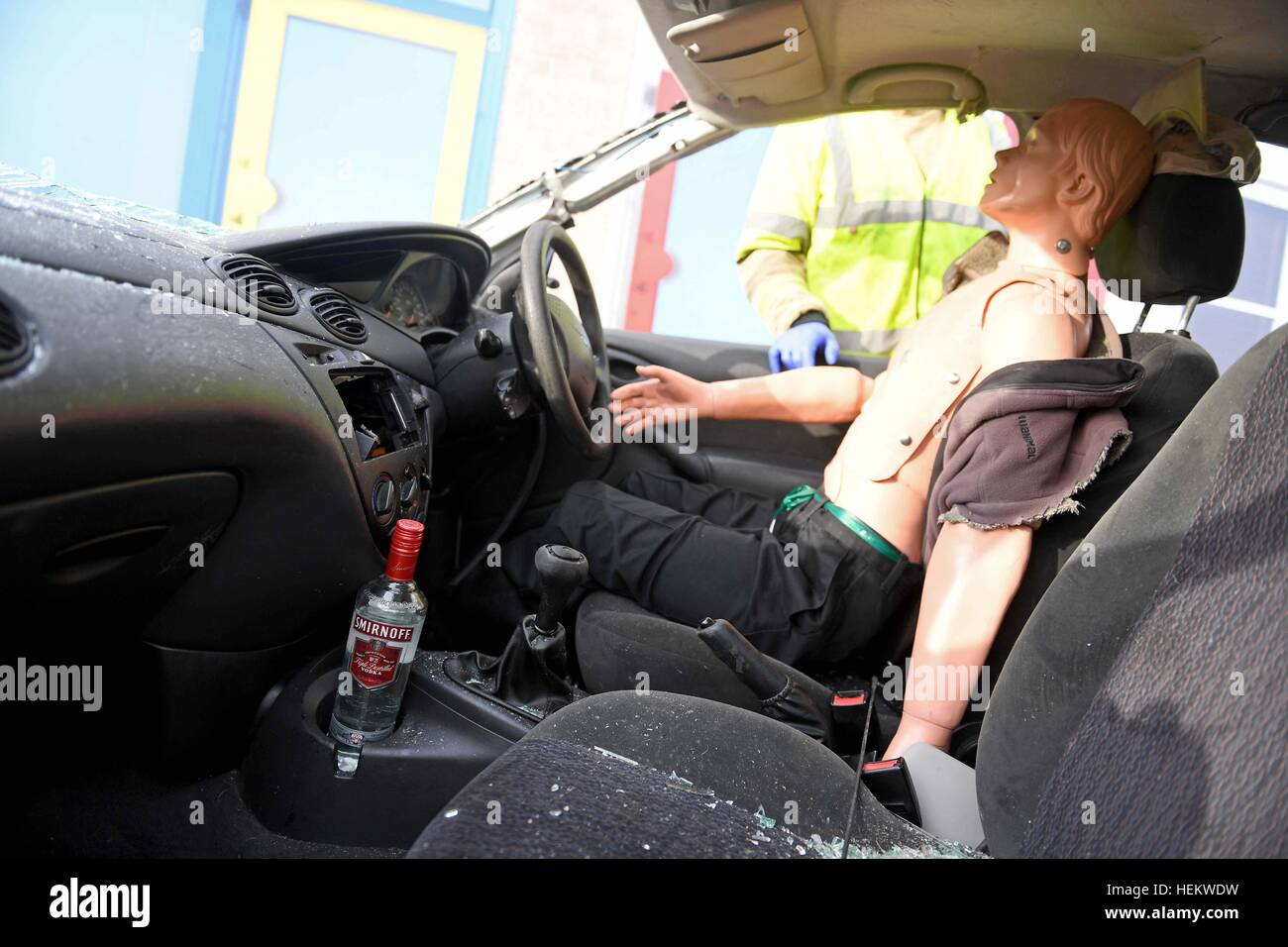 Bottle of alcohol in a car during a demonstration of an accident, UK ...