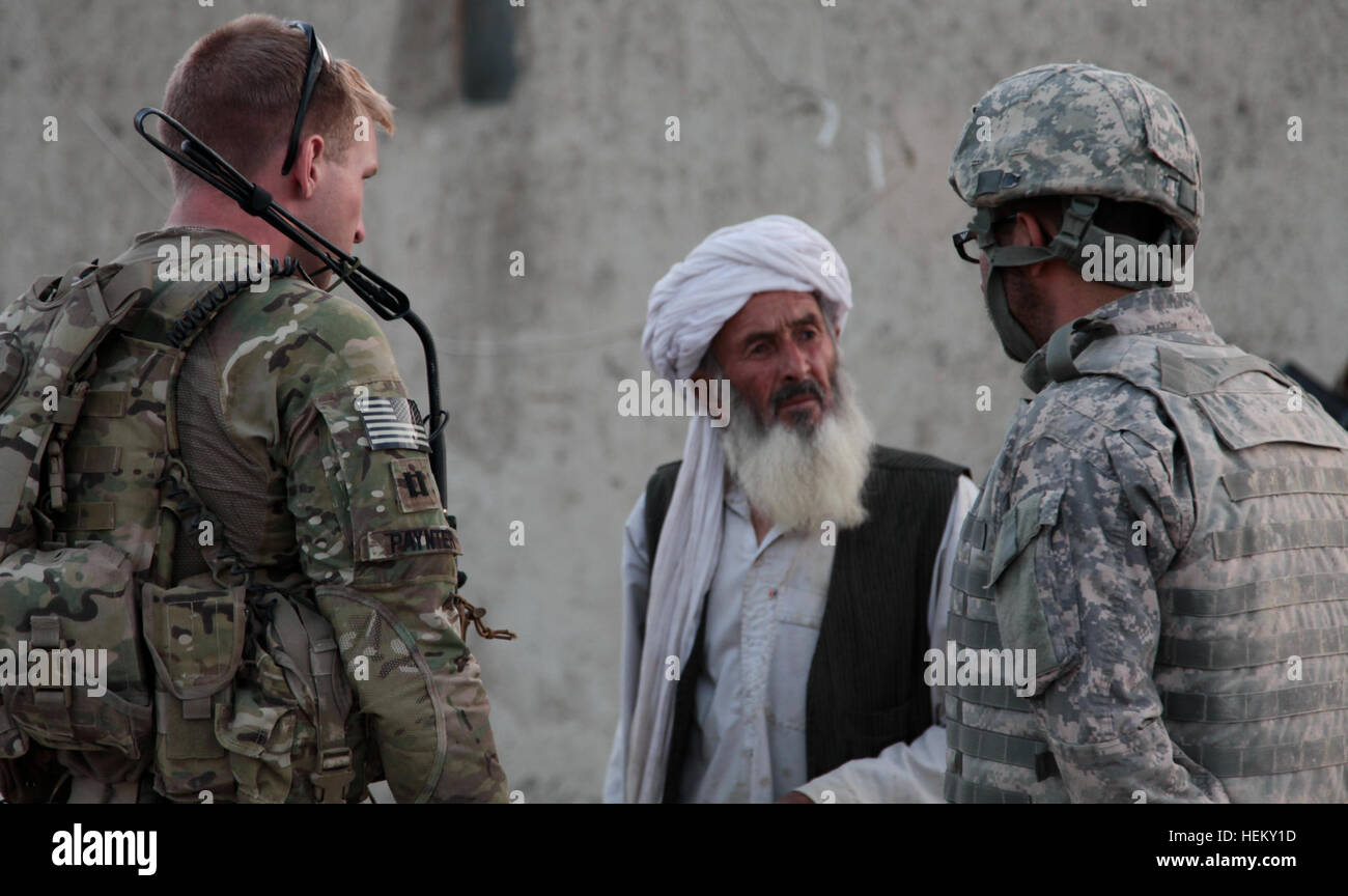 U.S. Army Capt. Paynter, 2nd Squadron, 38th Cavalry Regiment talks with ...