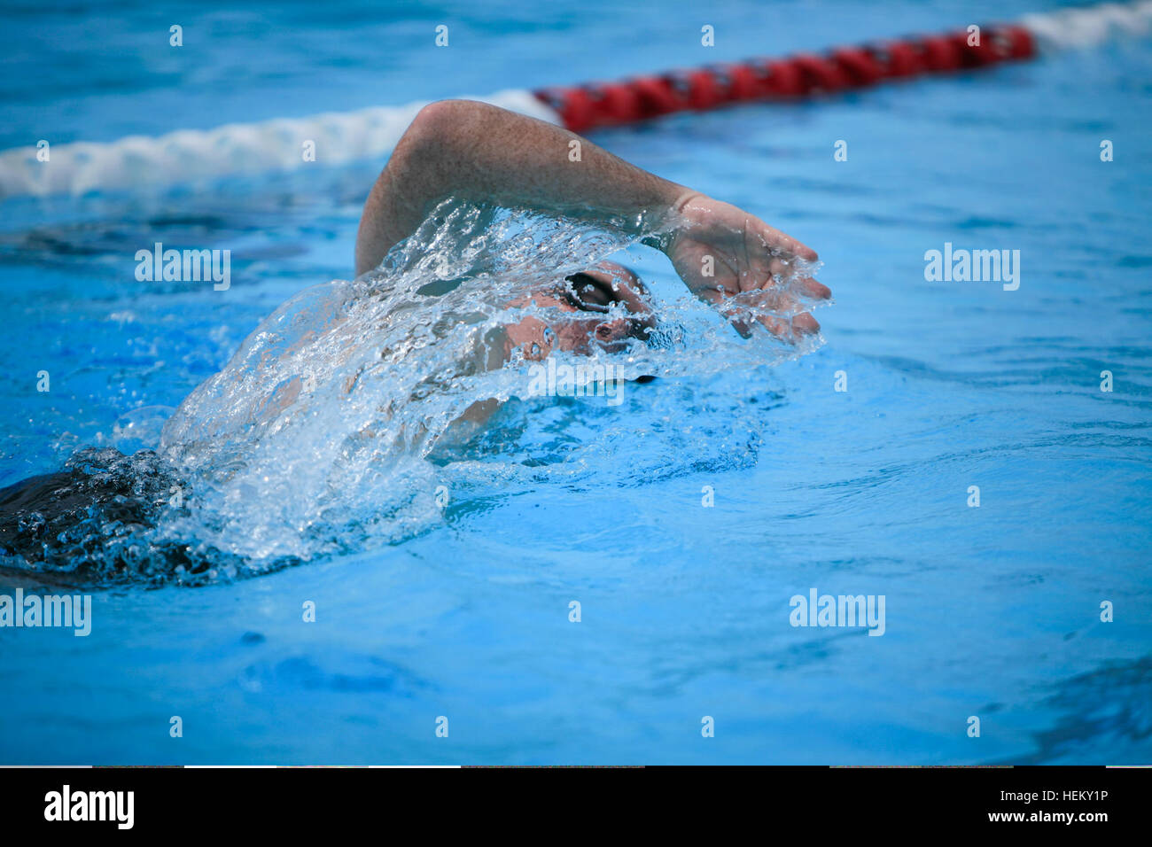 A U.S. Soldier participates in a 1-mile Morale Welfare Recreation swim ...
