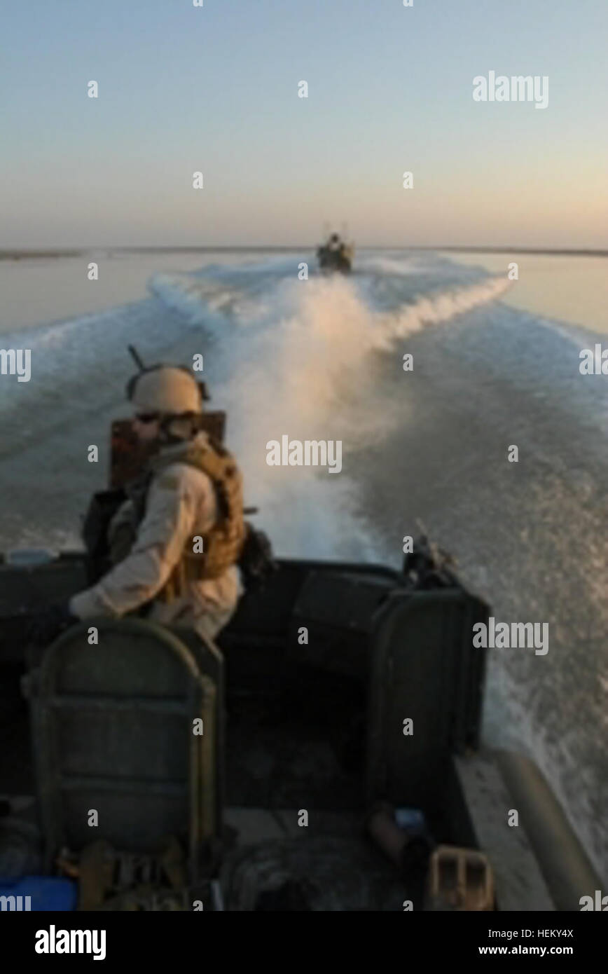 With the Riverine Assault Boat bringing up the rear, aft gunner and ...