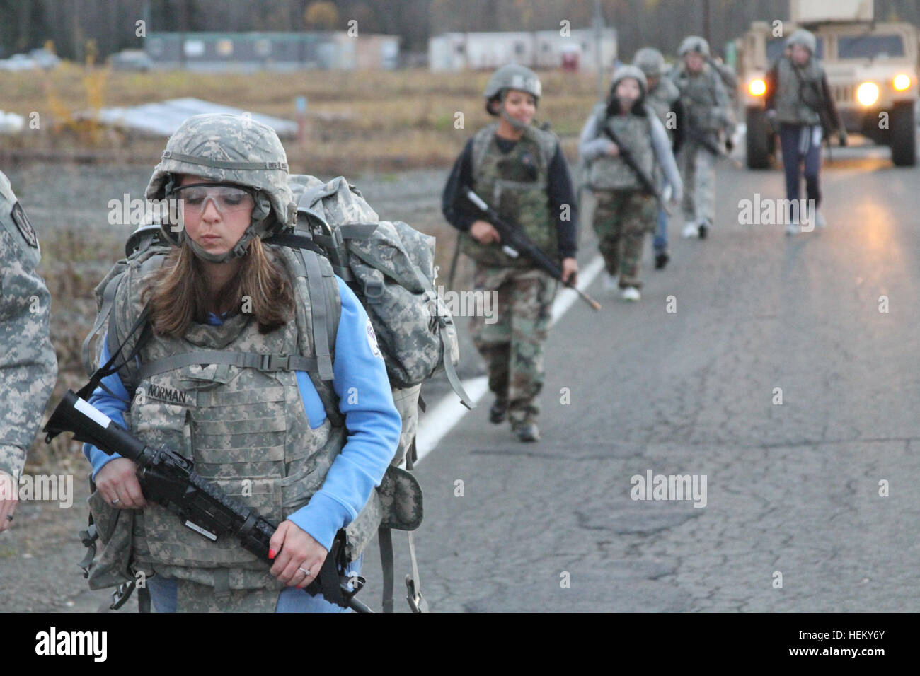 Spouses of the 793rd Military Police Battalion on a road march in their ...