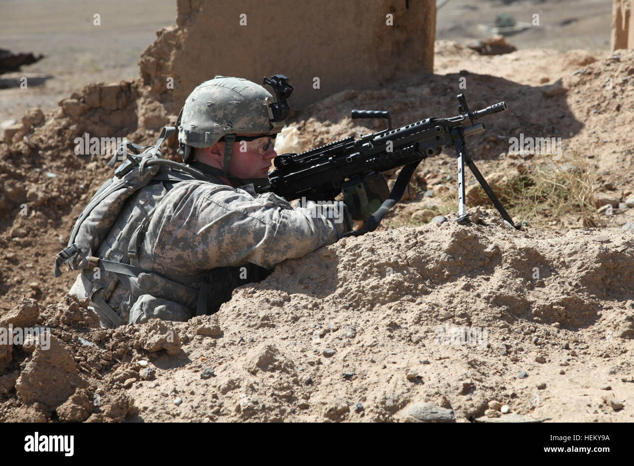 A U.S. Army Cavalry scout provides security during a visit to an Afghan ...