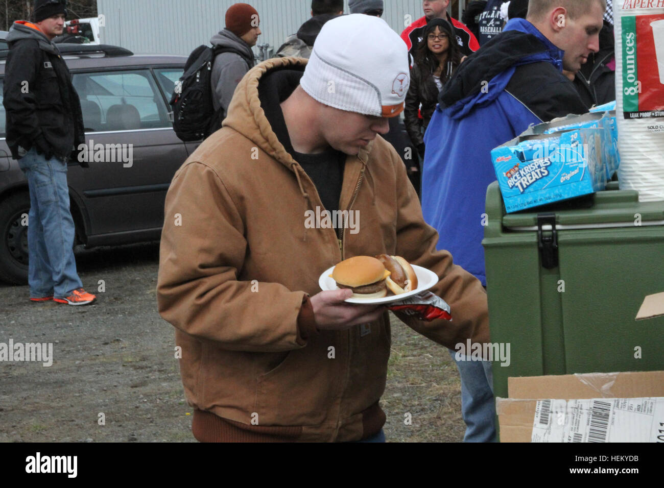 A soldier carries his food from the chow line during the 17th CSSB’s ...