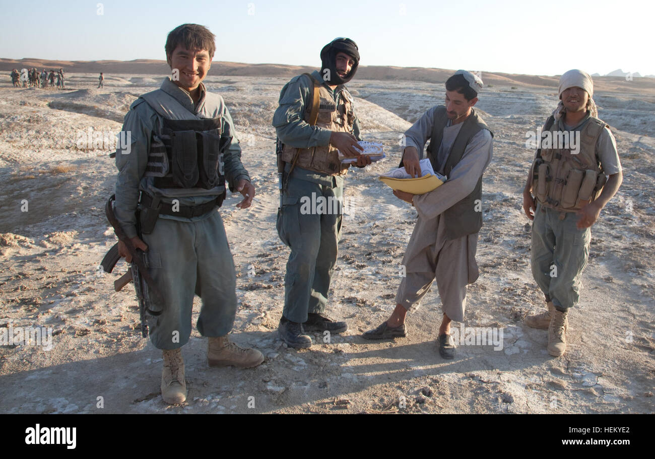 A group of Afghanistan Border Police hold flyers near Shadizi Kalay ...