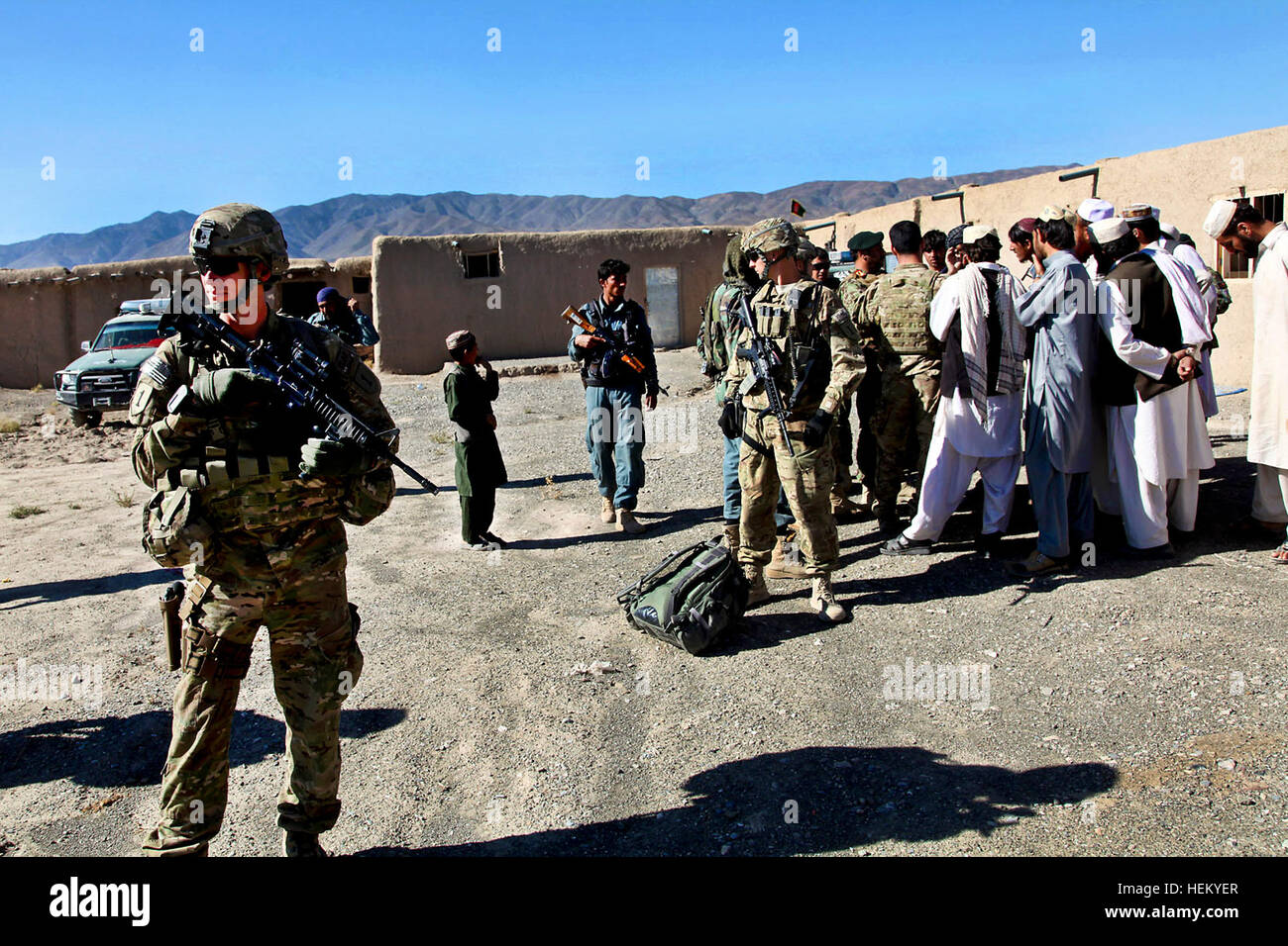 U.S. Army Capt. Tim Black (left), an intelligence officer from Van Ward ...