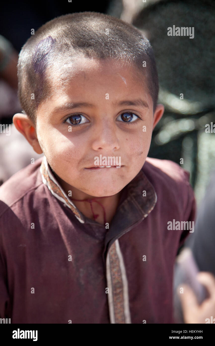 A young boy looks at the camera at the Women's Center in Forward ...