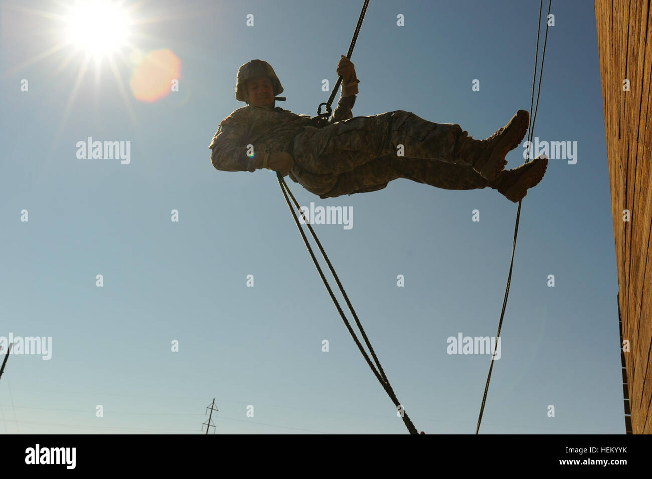 Spc. James Cutbirth from the Site Security Team bounds off the rappel ...