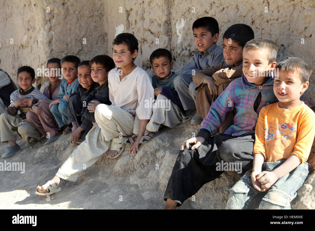 A group of young Afghan boys in a Bagram District village curiously ...