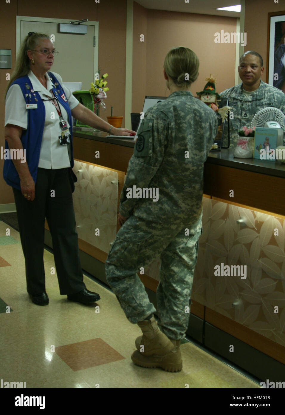 Clara Huff, left, talks with Sgt. 1st Class Dion Robertson and Capt ...