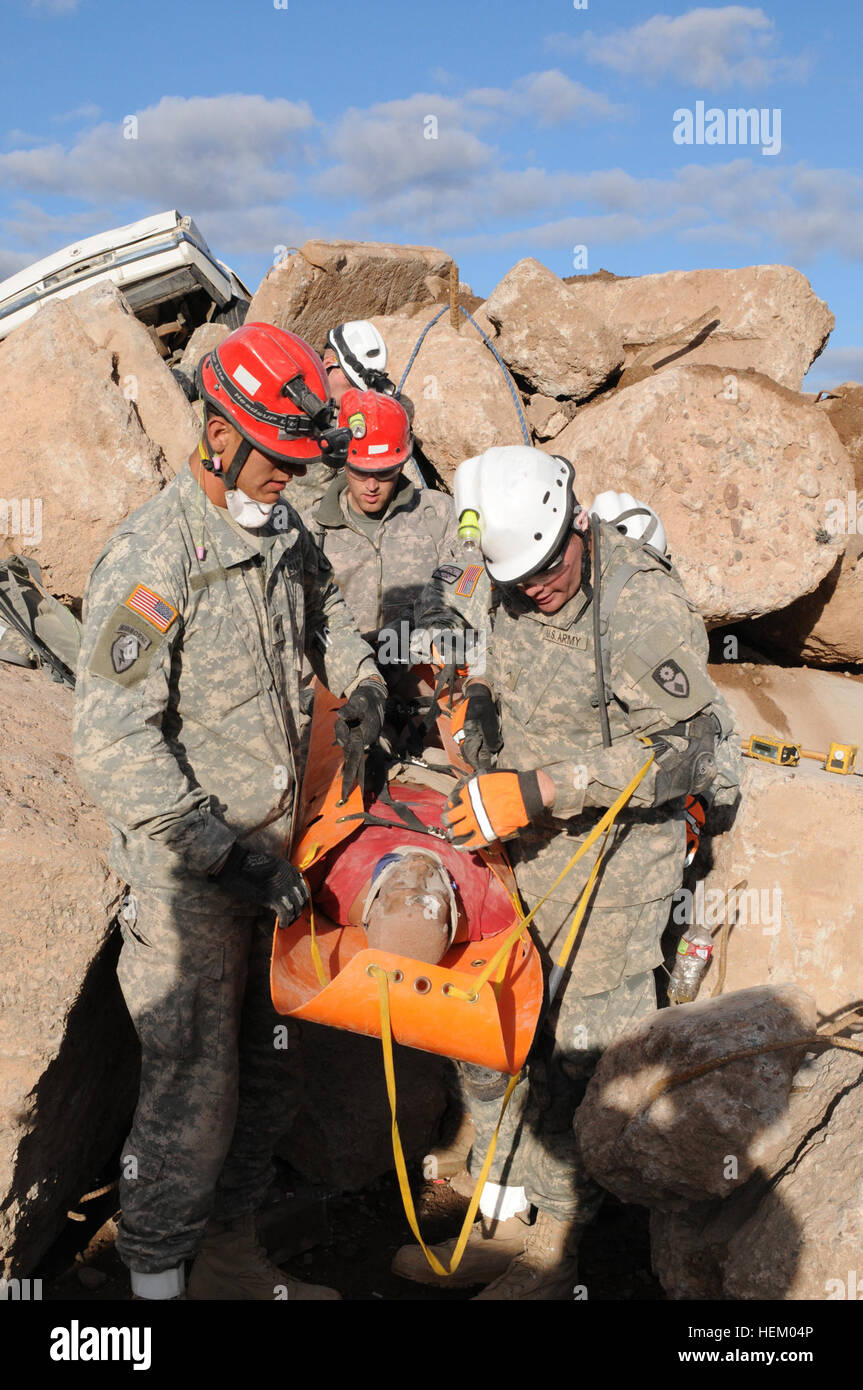 Spc. Tim Burrus, left, and Pvt. Alexander Ward, right, members of the ...