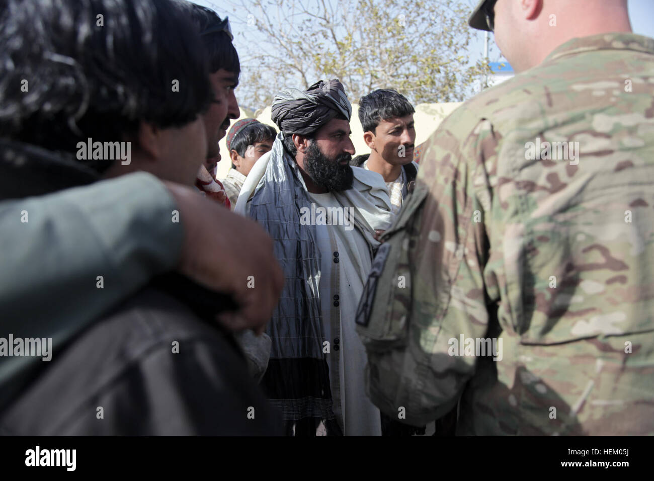 Afghan men attend an Afghan Local Police verification shura at Forward ...