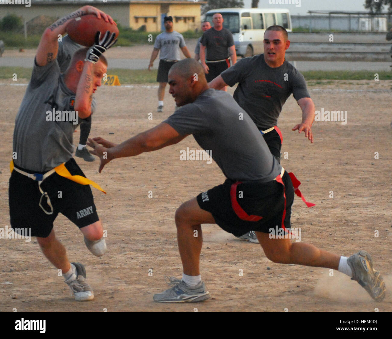 A flag football player with 2nd Battalion, 3rd Field Artillery, runs ...