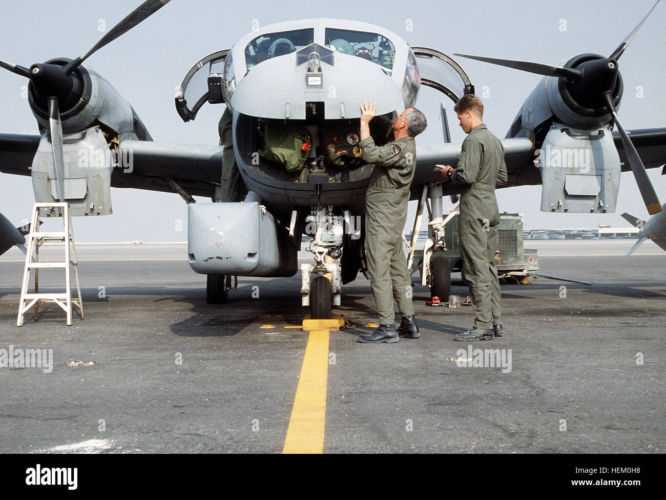 Chief Warrant Officer John Fowler and Spc. Morgan Devane perform a pre ...