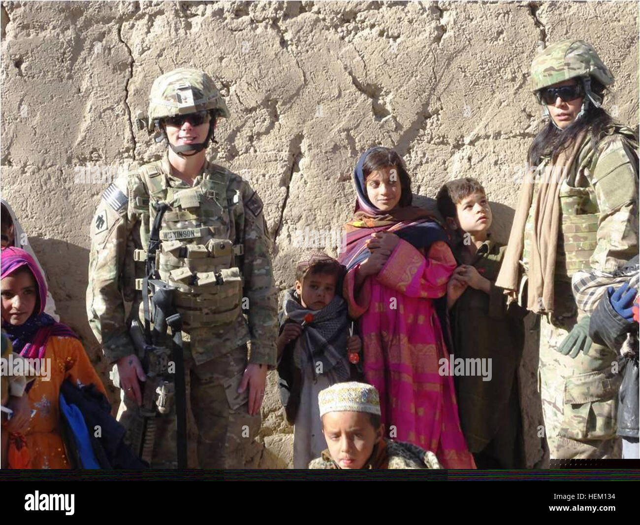 U.S. Army Spc. Jennifer Wilkinson (left) a Henryetta, Okla., native and ...