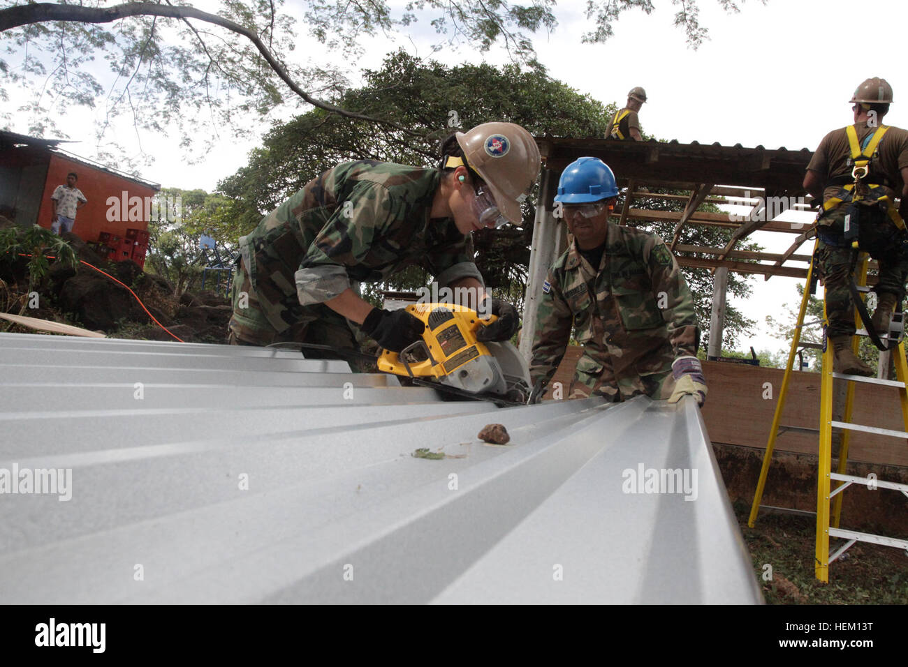 U.S. Navy Steel Worker 2nd Class Rejuny Caswell, assigned to Navy ...