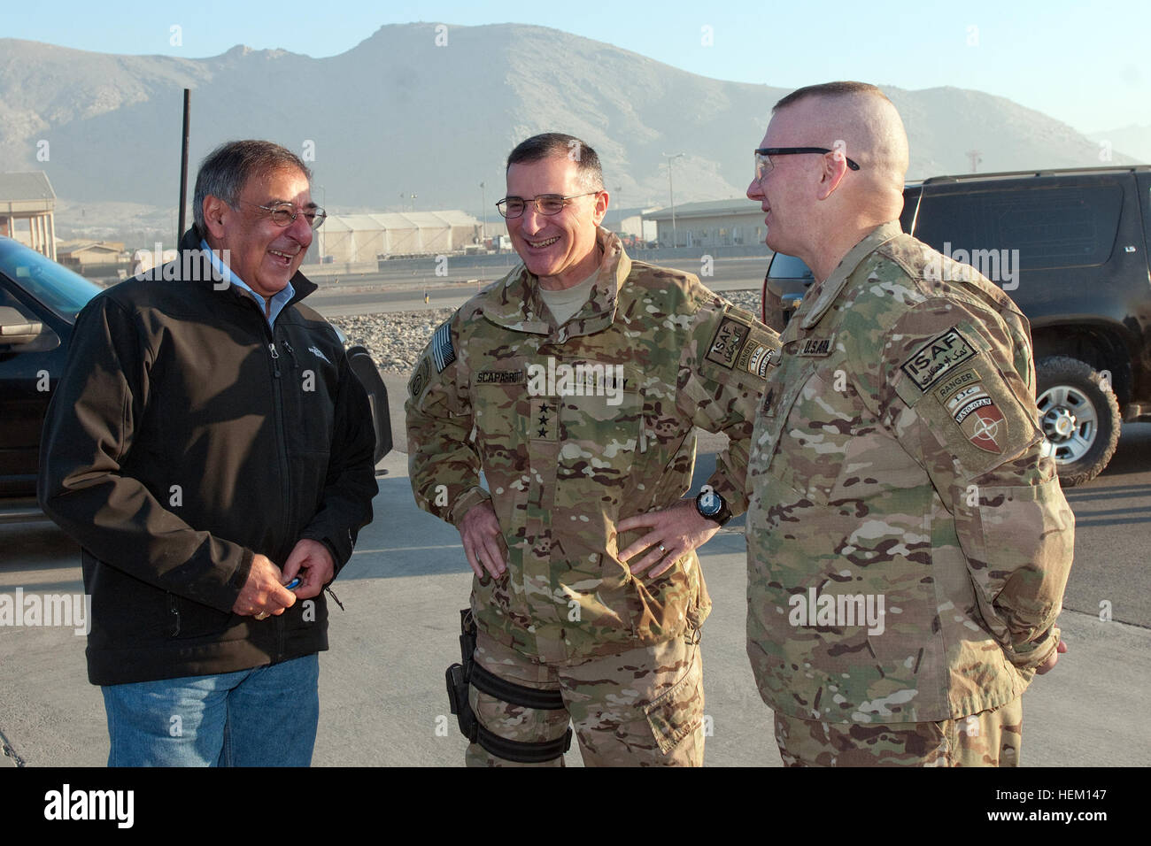 U.S. Secretary of Defense Leon Panetta shares a laugh with the ...