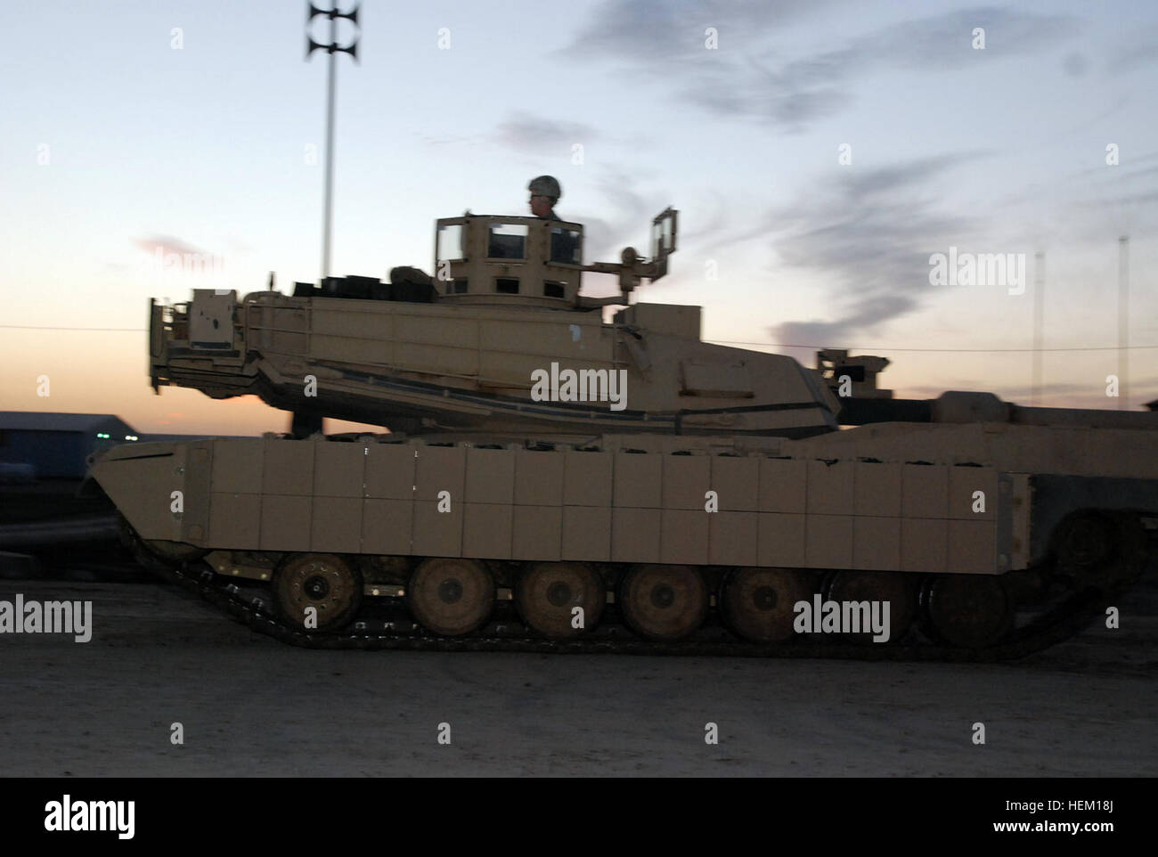 Silver Lions Soldiers move an M1-A2 Abrams tank after loading it with ...