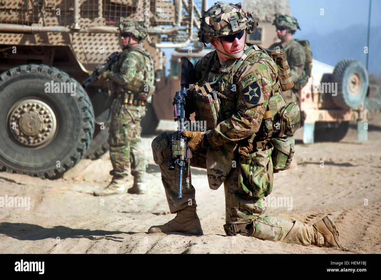 A U.S. Soldier with the 5th Battalion, 20th Infantry Regiment provides ...