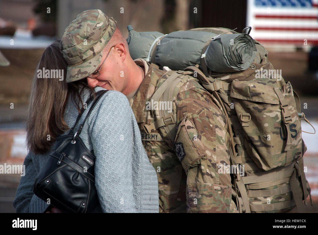 Pfc. Drew Anderson, 576th Engineer Company, embraces his wife, Shawna ...
