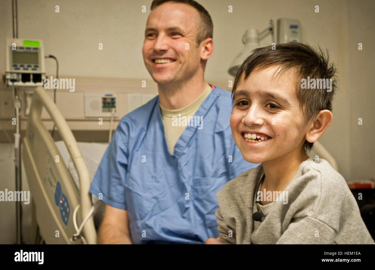 Najibullah, 10, shares a laugh with Air Force Maj. (Dr.) Joe DuBose ...
