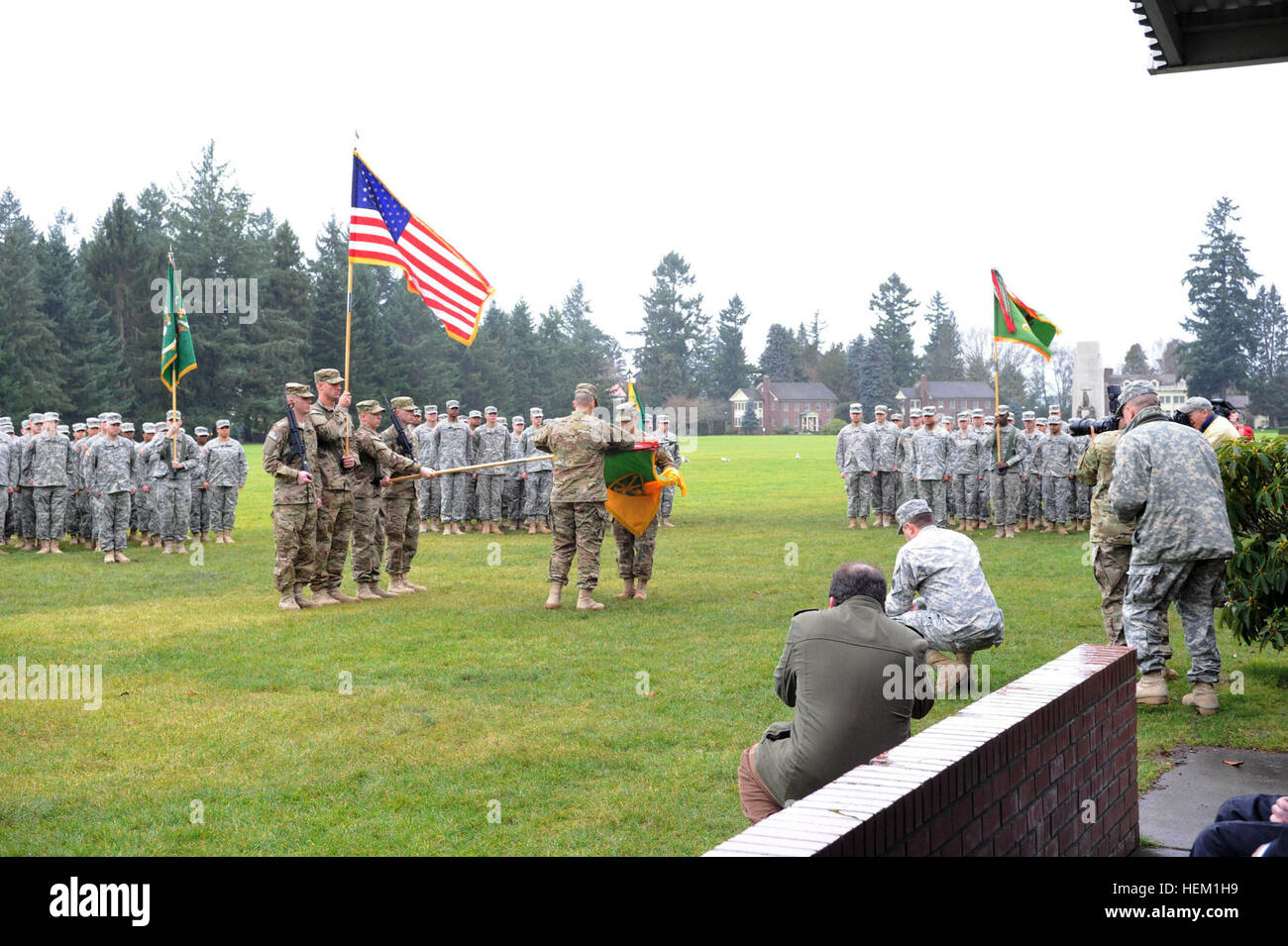 U.S. Army Col. Robert M. Taradash, center, and Command Sgt. Maj. Dawn J ...