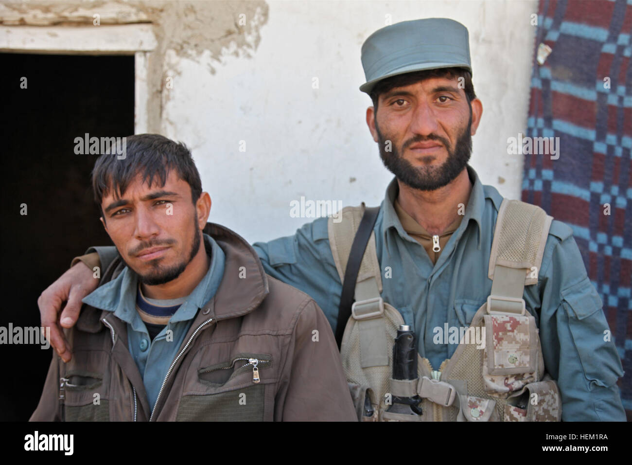 Afghan Uniform Police officers look at the camera in Pul-e Alam, Logar ...