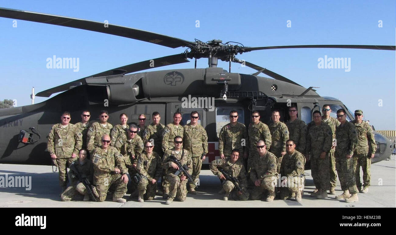 Soldiers of F. Company, 5-159th Aviation MEDEVAC pose in front of their ...