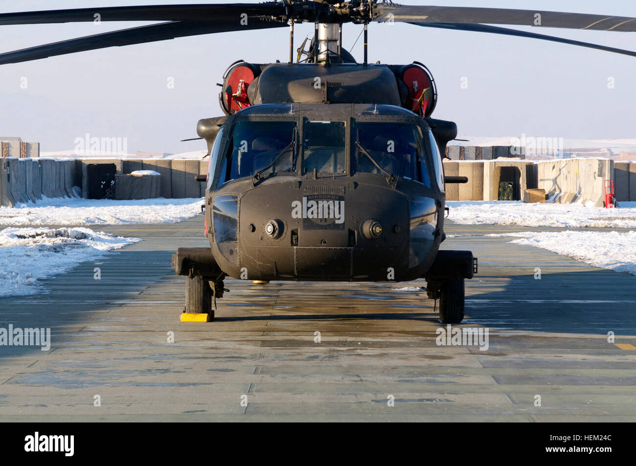 A Task Force Corsair UH-60M Black Hawk helicopter sits on a pad at ...