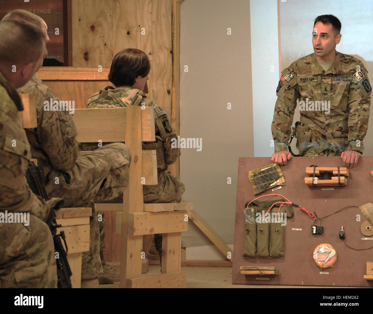 Army 1st Lt. Matthew B. Wharton displays different materials used to ...