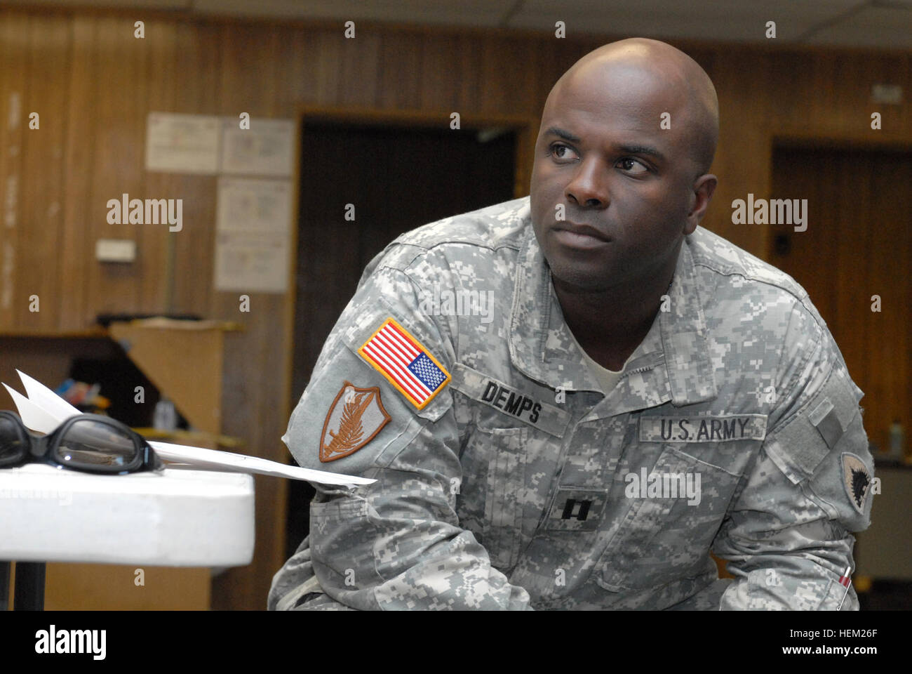 Capt. William Demps, commander, 273rd Military Police Company listens ...