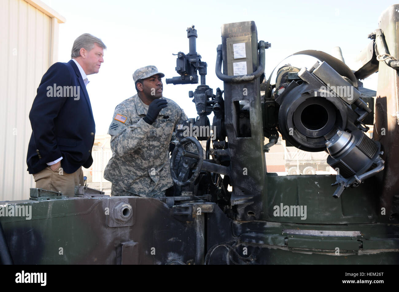 Mr. Bob Meyers, a member of the Defense Orientation, is shown how to ...