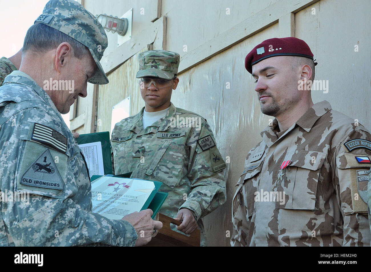 A medic with the Czech Republic Provincial Reconstruction Team receives ...