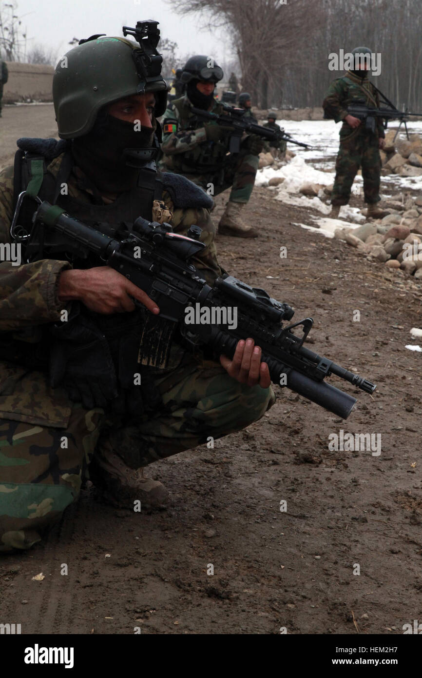 Commandos from the Afghan National Army, 5th Commando Kandak, provide ...