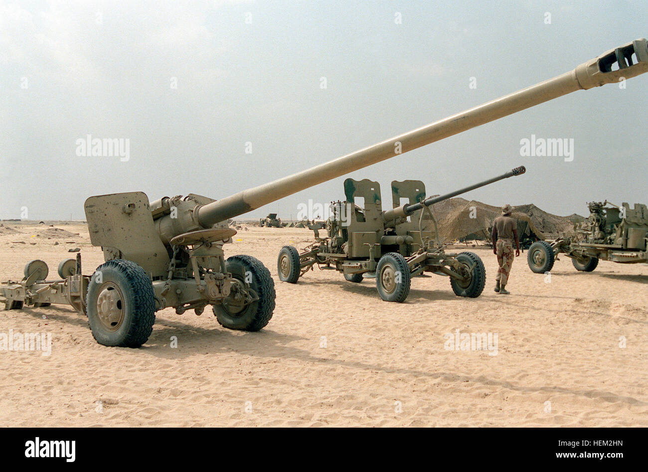 A left fron view of a Type 59 130mm field gun, and an Iraqi S-60 57mm ...