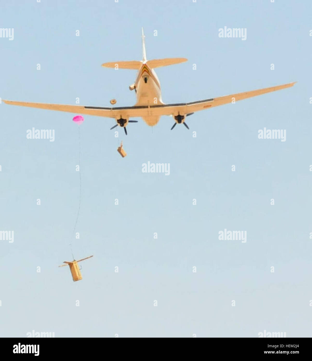 MOPTI, MALI -- A Malian Air Force BT-67 drops helicopter boxes as part ...