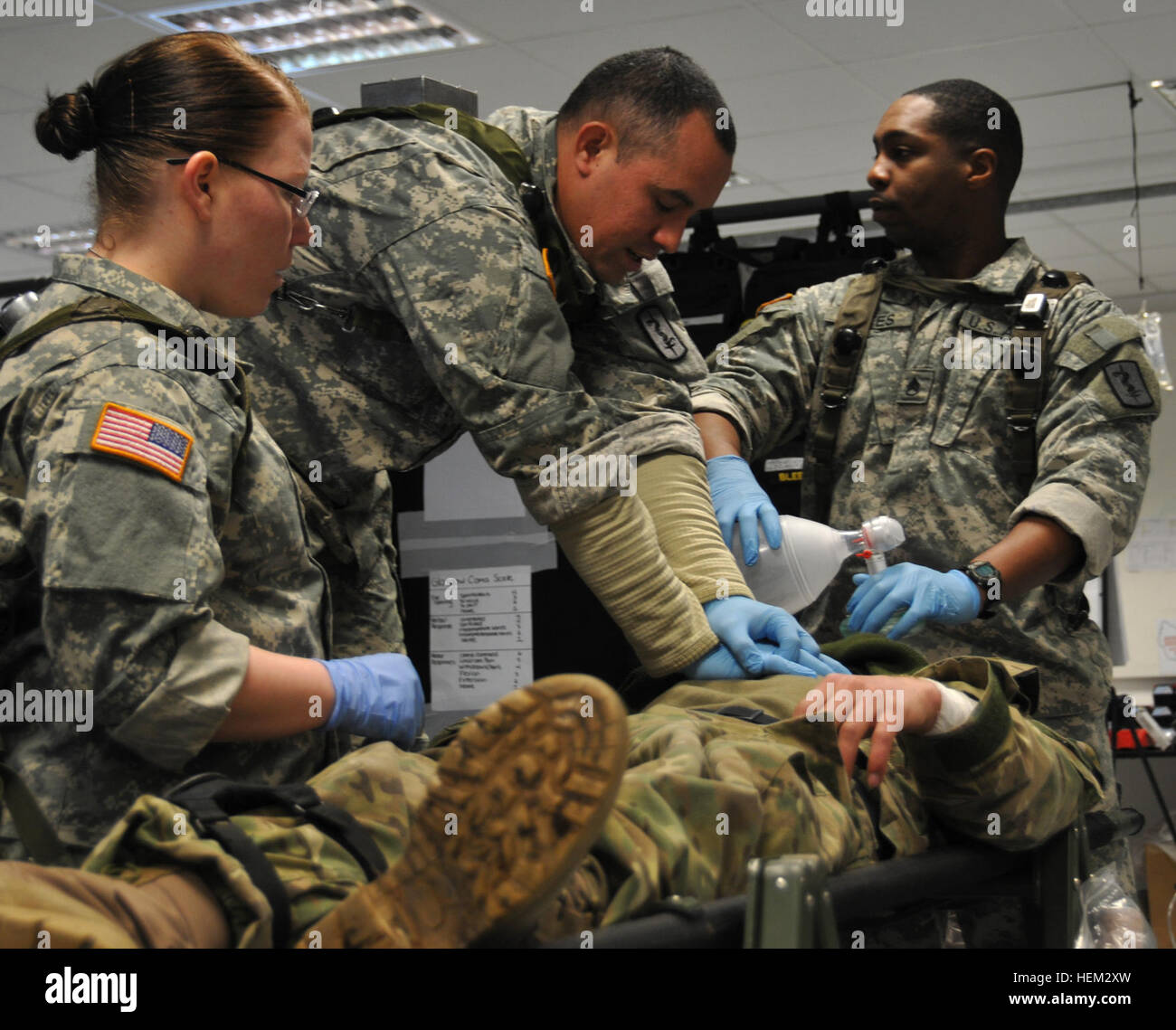 U.S. Army Soldiers of the 557th Medical Company provide medical care to ...