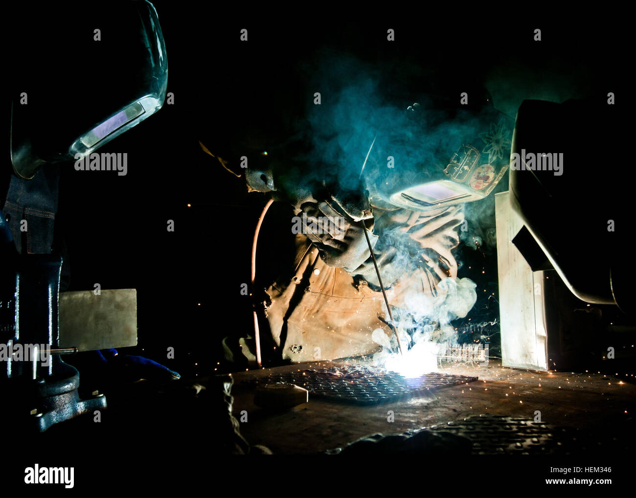 Spc. Brady Myatt, from Austin, Texas, demonstrates basic welding ...