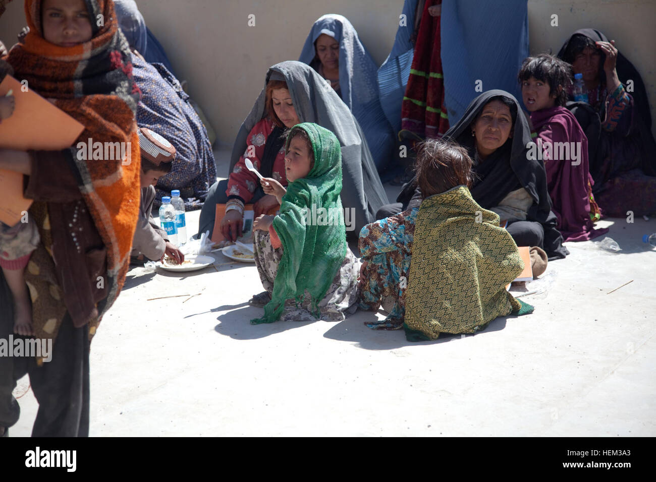 Local women and children gather for international Women's Day at the ...