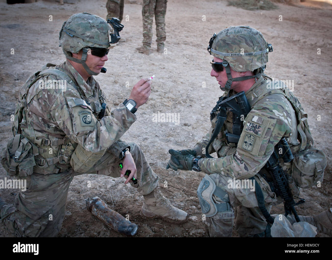 Spc. Benjamin Creed, from Kansas, demonstrates for Spc. Eric Robinson ...