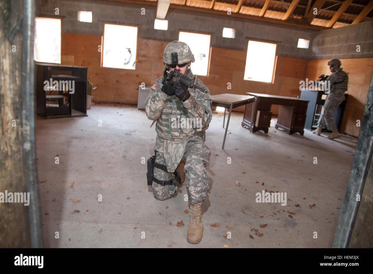US Army soldiers from 554th Military Police Company perform stacking ...